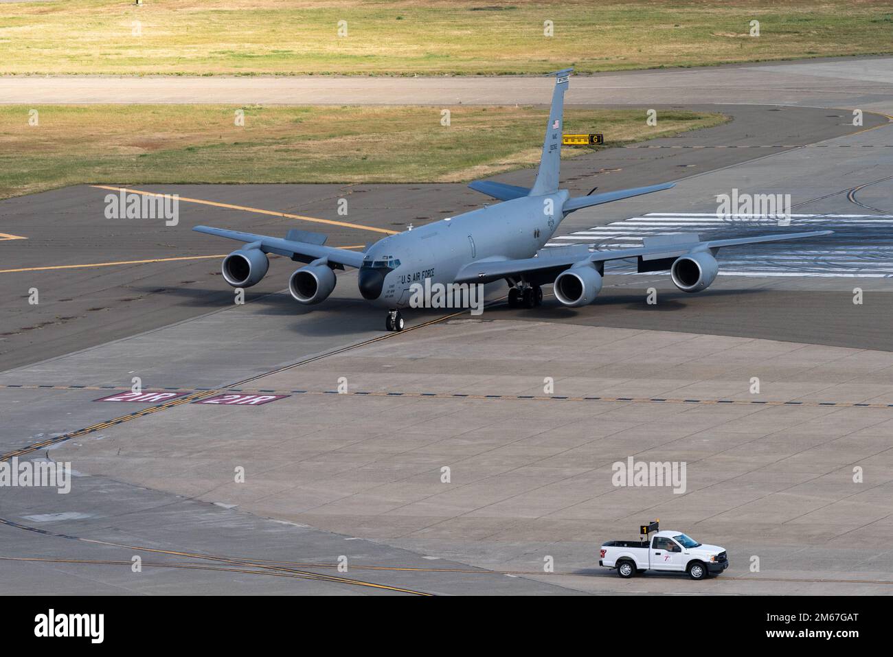 A U.S. Air Force KC-135RT Stratotanker follows a transient alert guide ...