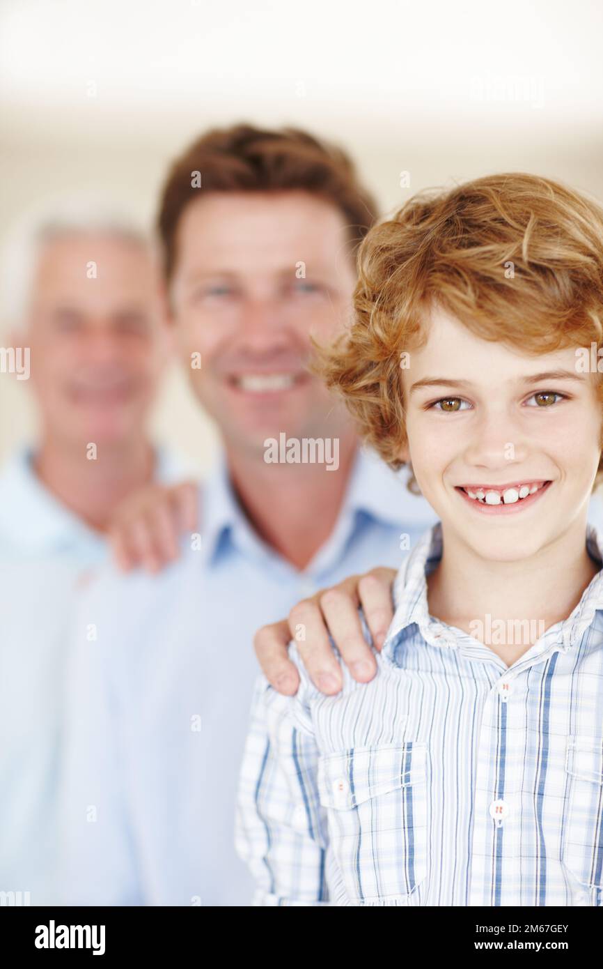 They got each others backs. Cropped portrait of a young boy standing ...