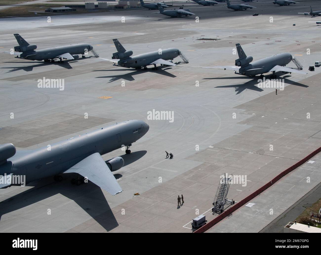 U.S. Airmen service a KC-10 Extender aircraft at Travis Air Force Base ...