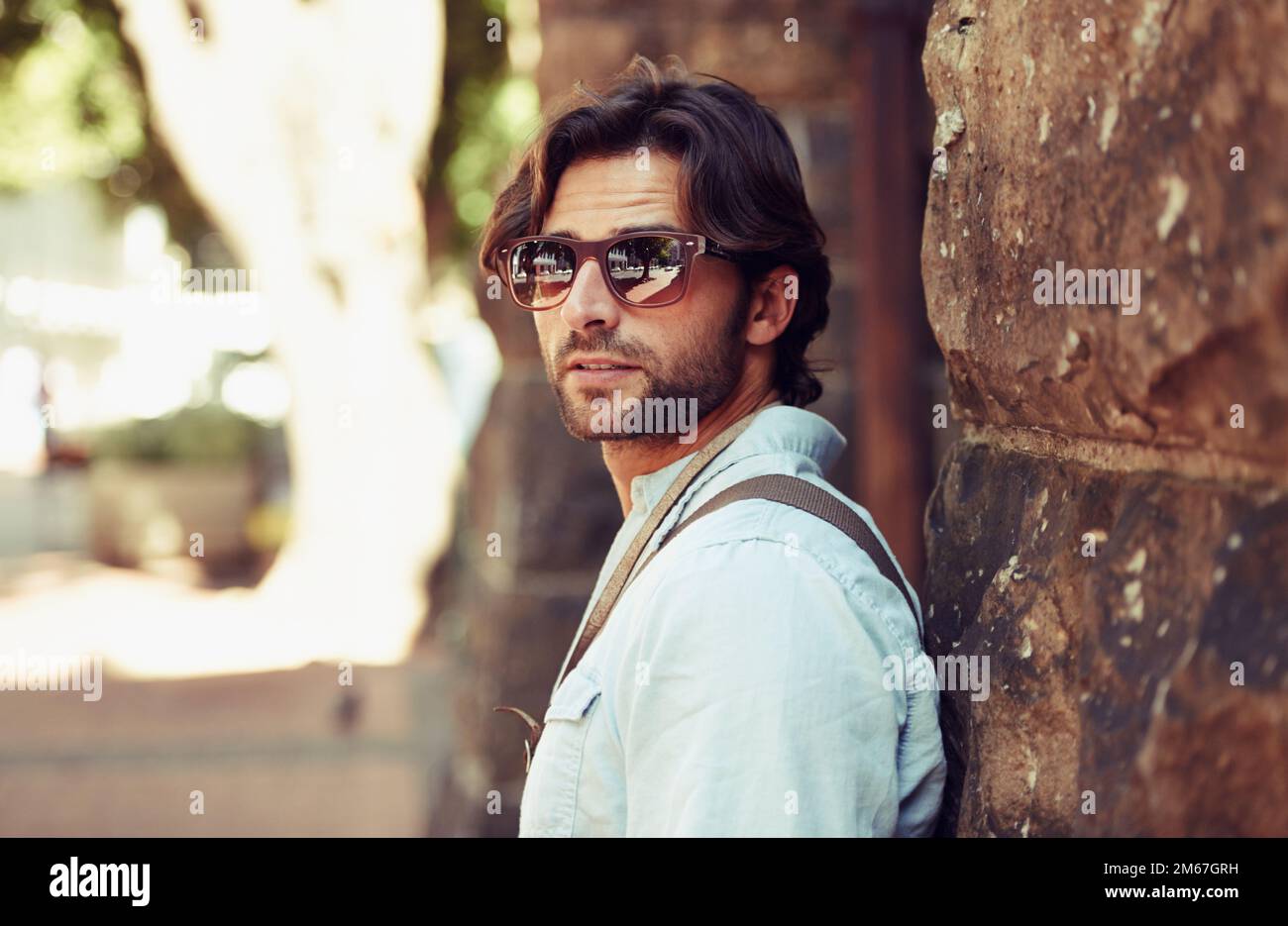 Not all those who wander are lost. a handsome young man standing ...