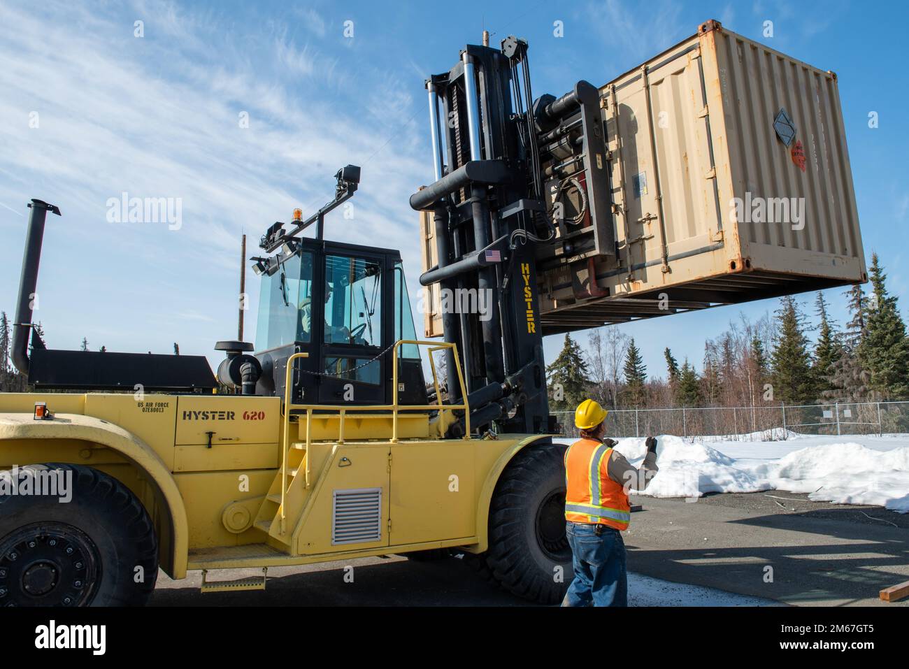 Chuck Aldeman, driving the forklift, and Tim Sage, both 773d Logistics ...