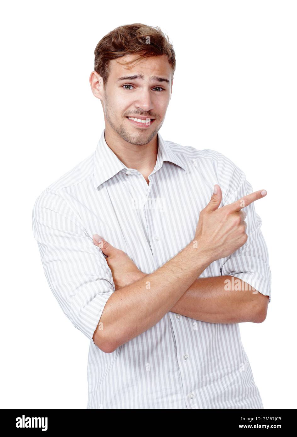 Youve got to check that out. Studio portrait of a young man pointing to ...