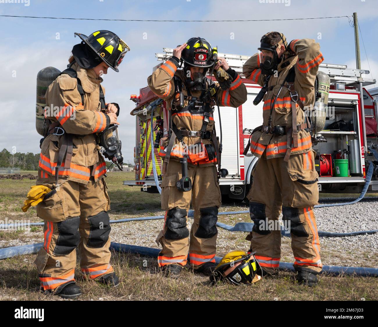 Firefighters from the 96th Civil Engineer Squadron, gear up for their ...