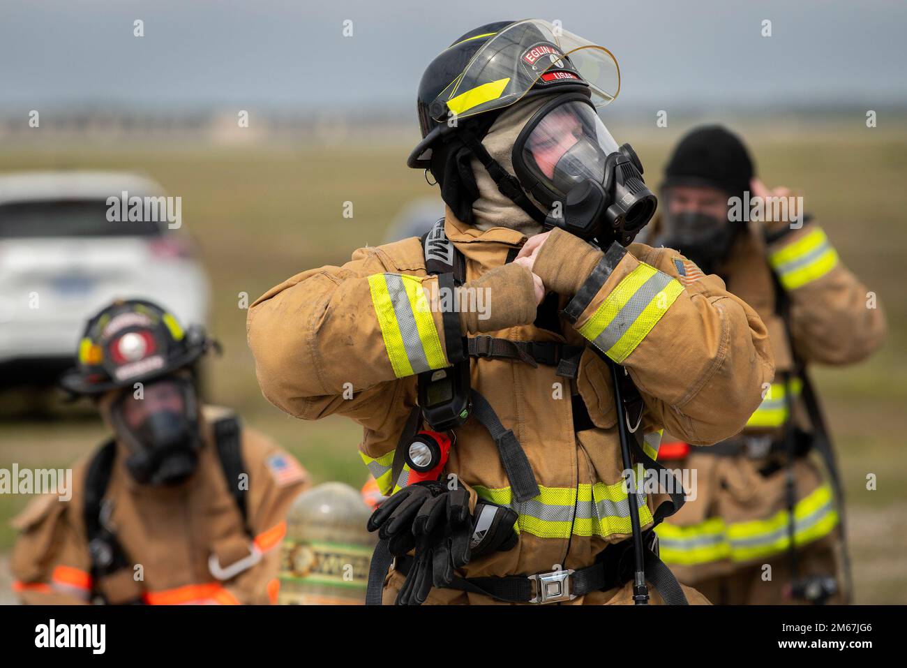 Firefighters from the 96th Civil Engineer Squadron, gear up for their ...