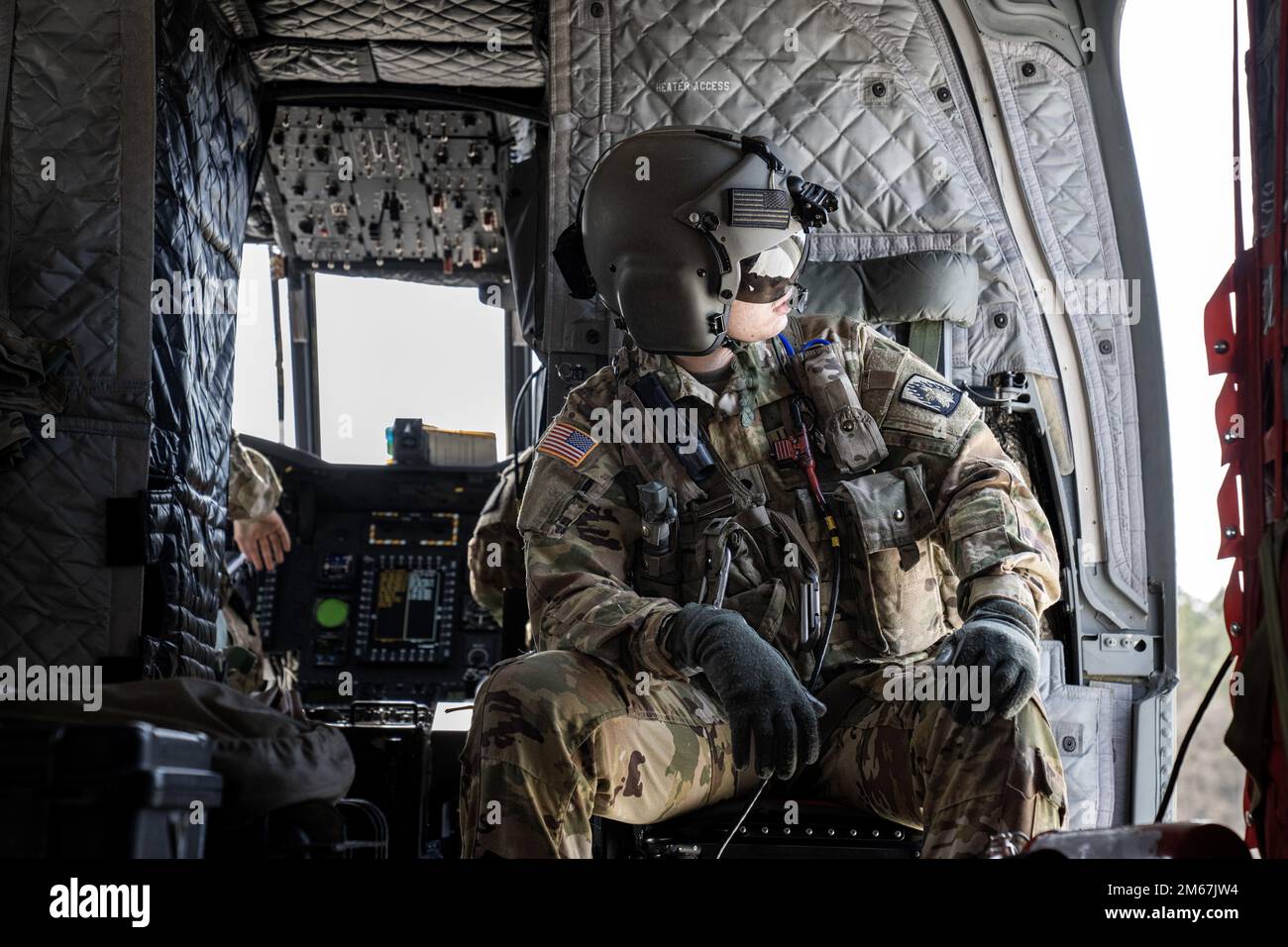 U.S. Army Spc. Austin Custer, a CH-47 Chinook helicopter crew chief ...