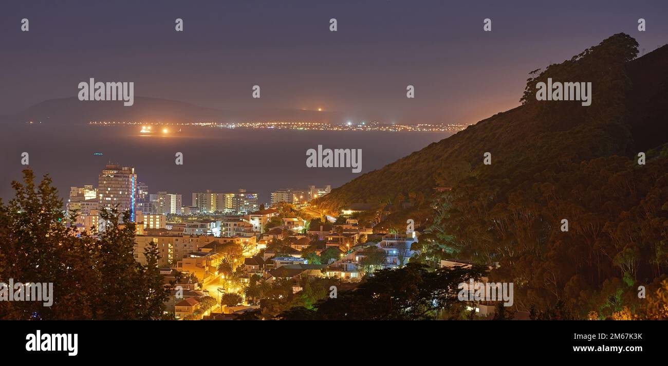 The city comes alive at night. View of a city landscape at night Stock ...