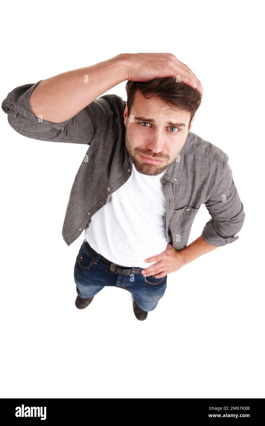 I have made a terrible mistake. High-angle shot of a young man in ...