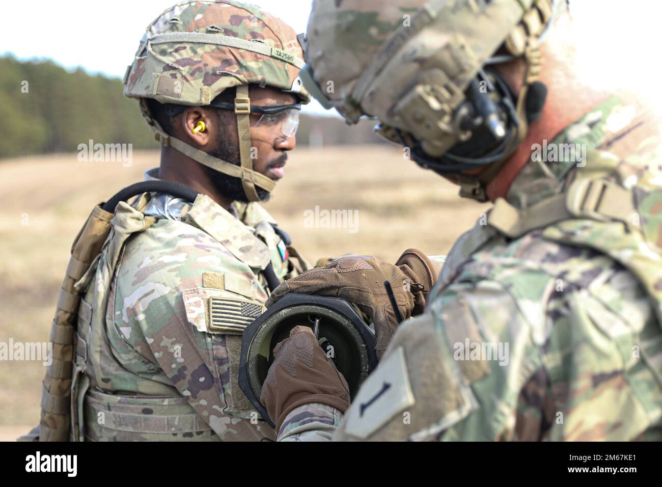 From left, U.S. Army Spc. Tramel Aclise, assigned to 2nd Battalion ...