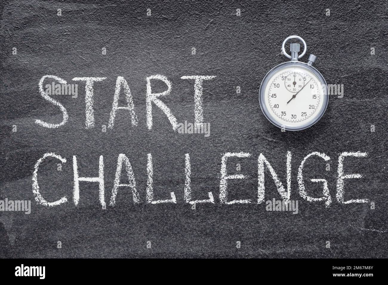 start challenge phrase written on chalkboard with vintage precise ...