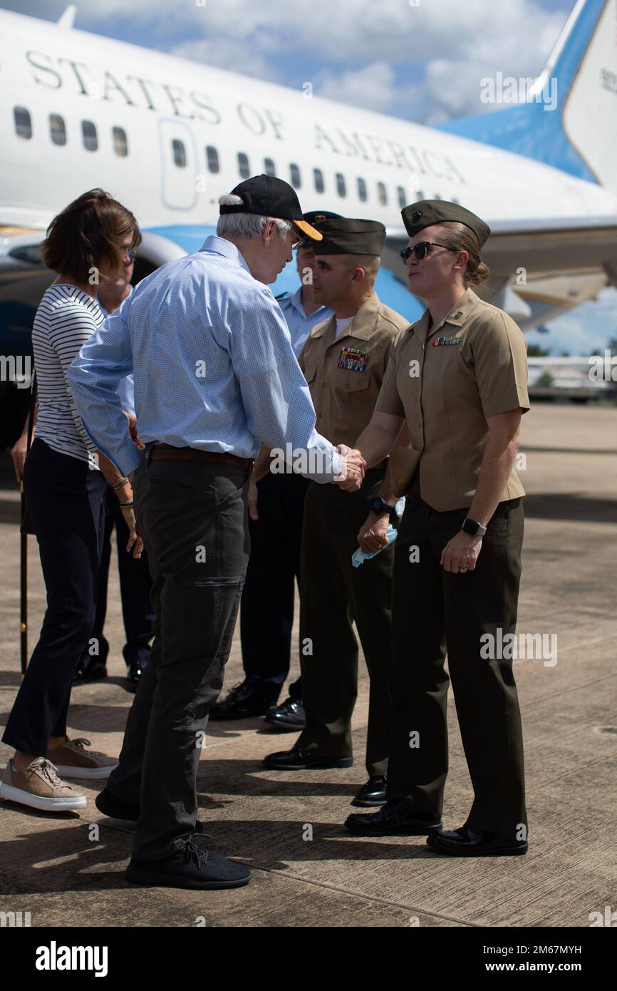U.S. Senator Robert Portman shakes hands with U.S. Marine Corps Capt ...