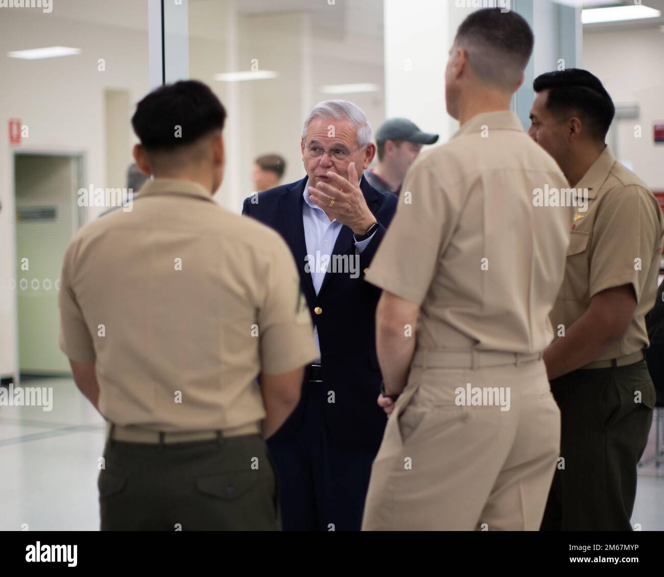 U.S. Senator Robert Menendez has a conversation with U.S. Marine Corps ...