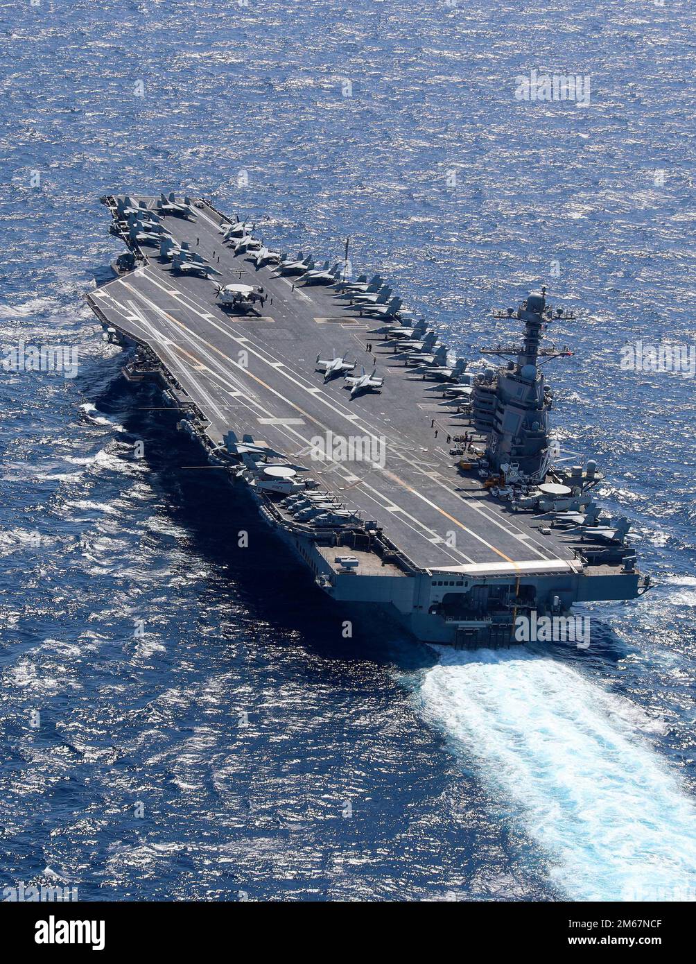 Aircraft attached to Carrier Air Wing (CVW) 8 sit on USS Gerald R. Ford ...