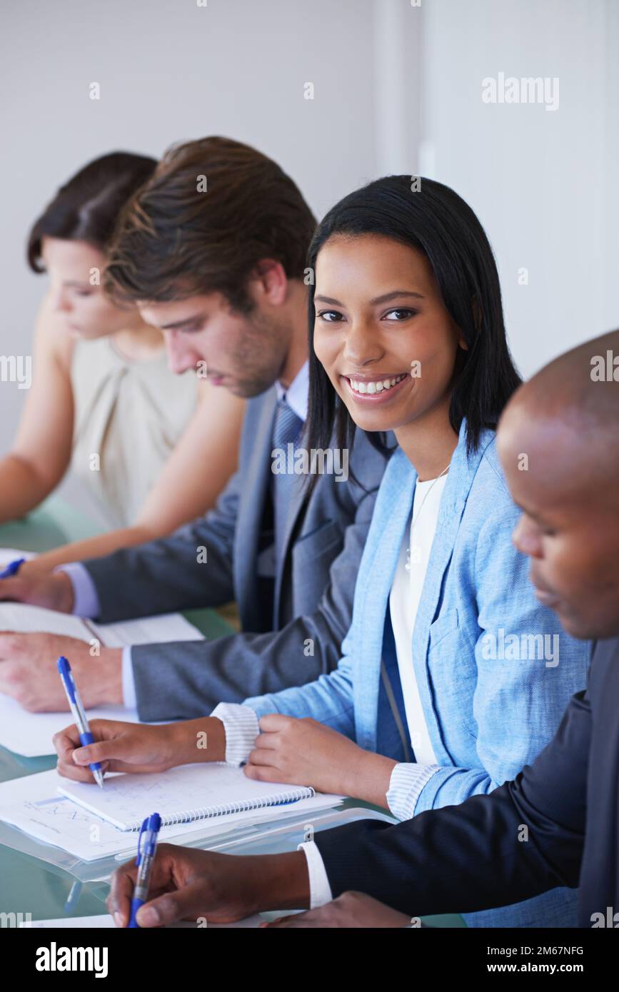 Its great being a part of this team. Portrait of a young businesswoman ...