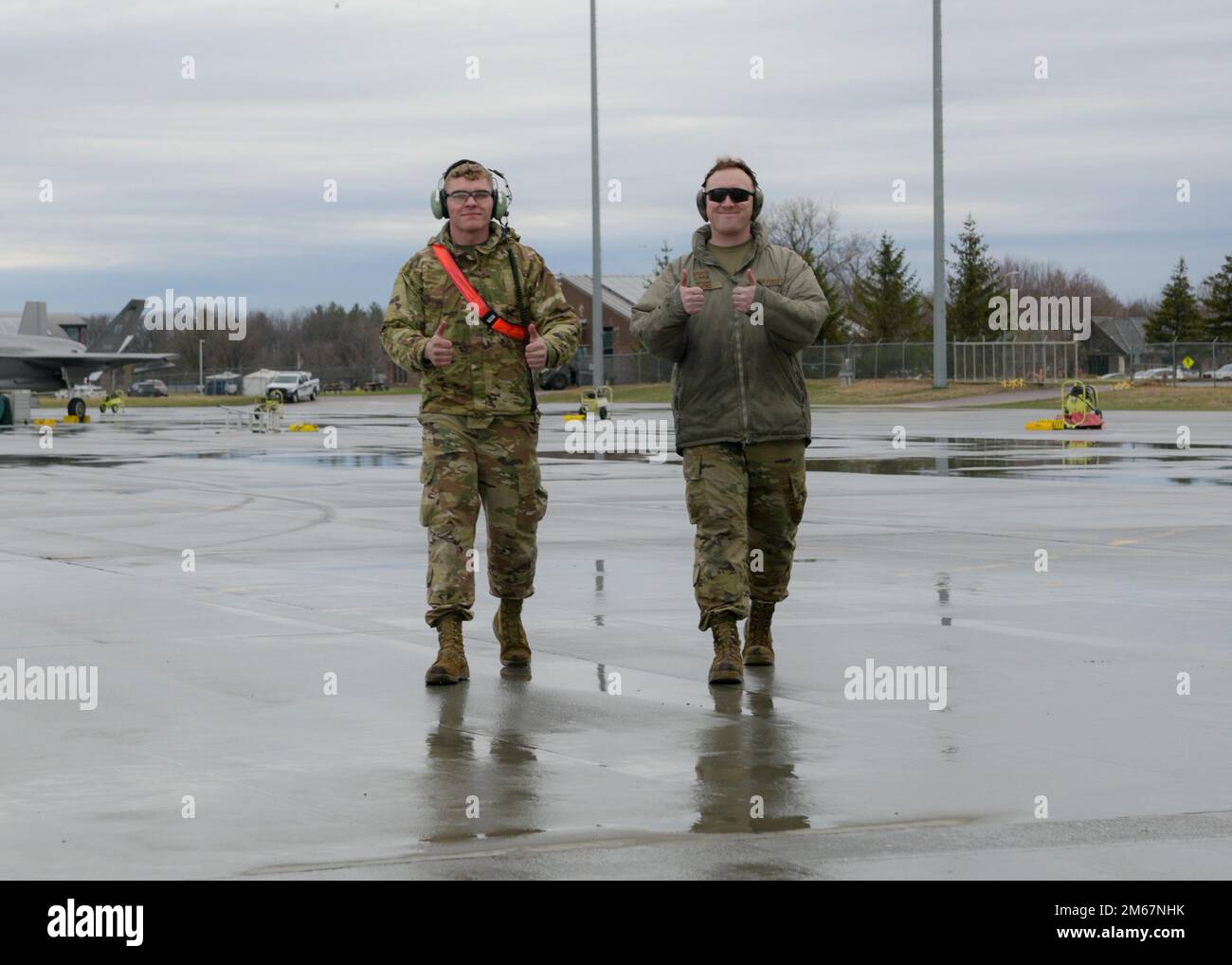 U.S. Air Force Senior Airman Kyle Pamperin and Staff Sgt. Marcel Emond ...
