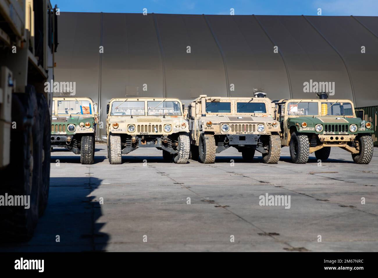 Four U.S. Army high-mobility multipurpose wheeled vehicles from the 3rd ...