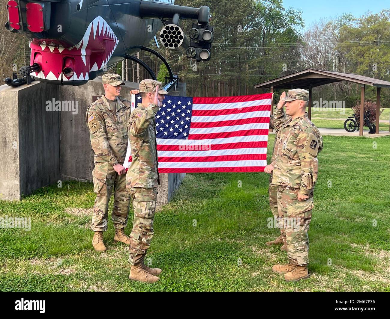 Capt. Jacob D. Terlizzi administers the oath of enlistment to Staff Sgt ...