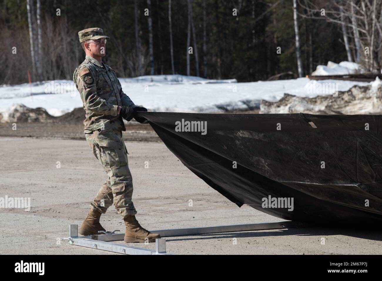 U.S. Air Force Senior Airman Jacob Graber, a Pacific Air Forces Civil ...