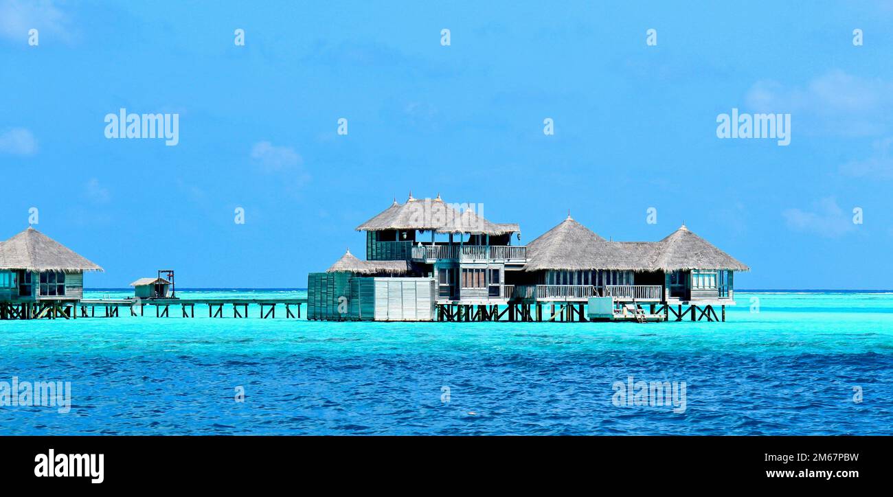 A natural view of beach houses in the beach of Maldives during summer ...