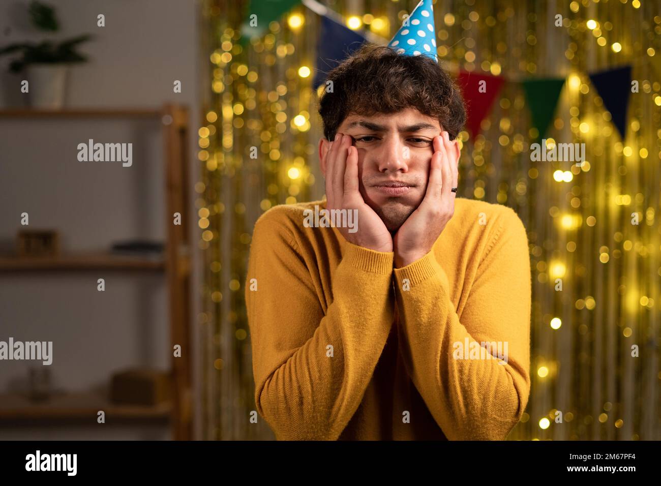 unhappy stressed young man touching face having unhappy look, feeling ...