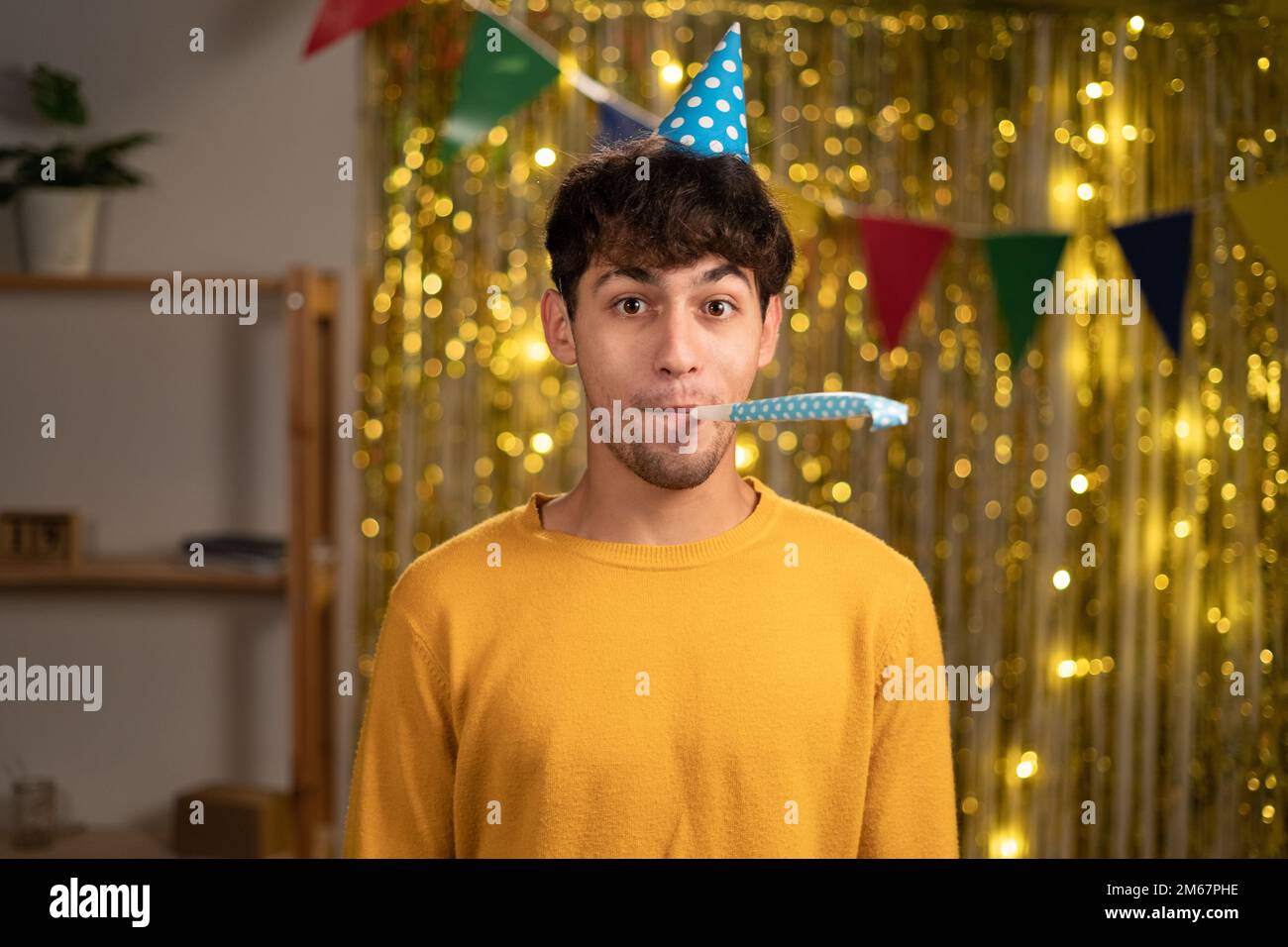 Adult and party hat and blower hi-res stock photography and images - Alamy