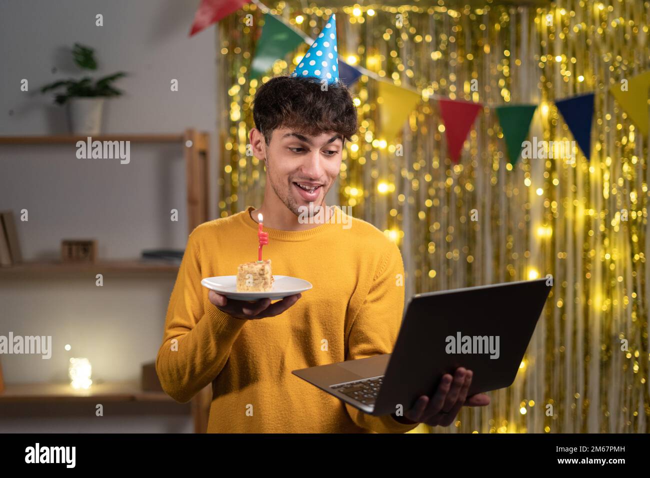 Virtual celebration birthday. Happy guy in party hat celebrating ...