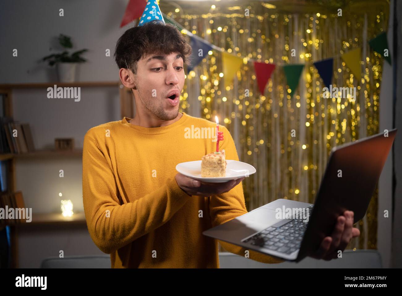 Virtual celebration birthday. Happy guy in party hat celebrating ...