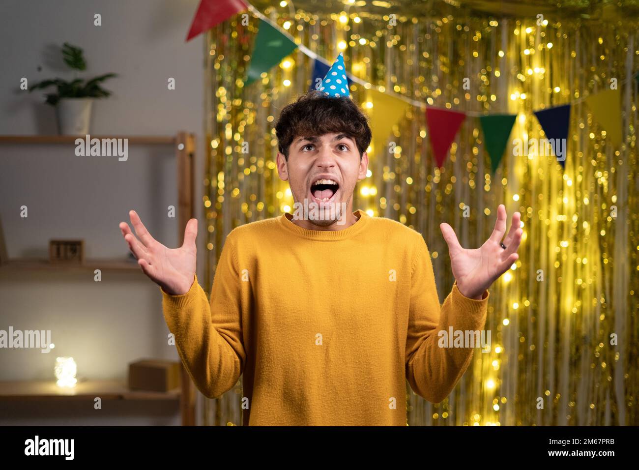 Angry screaming guy celebrating birthday party at home dissatisfied ...