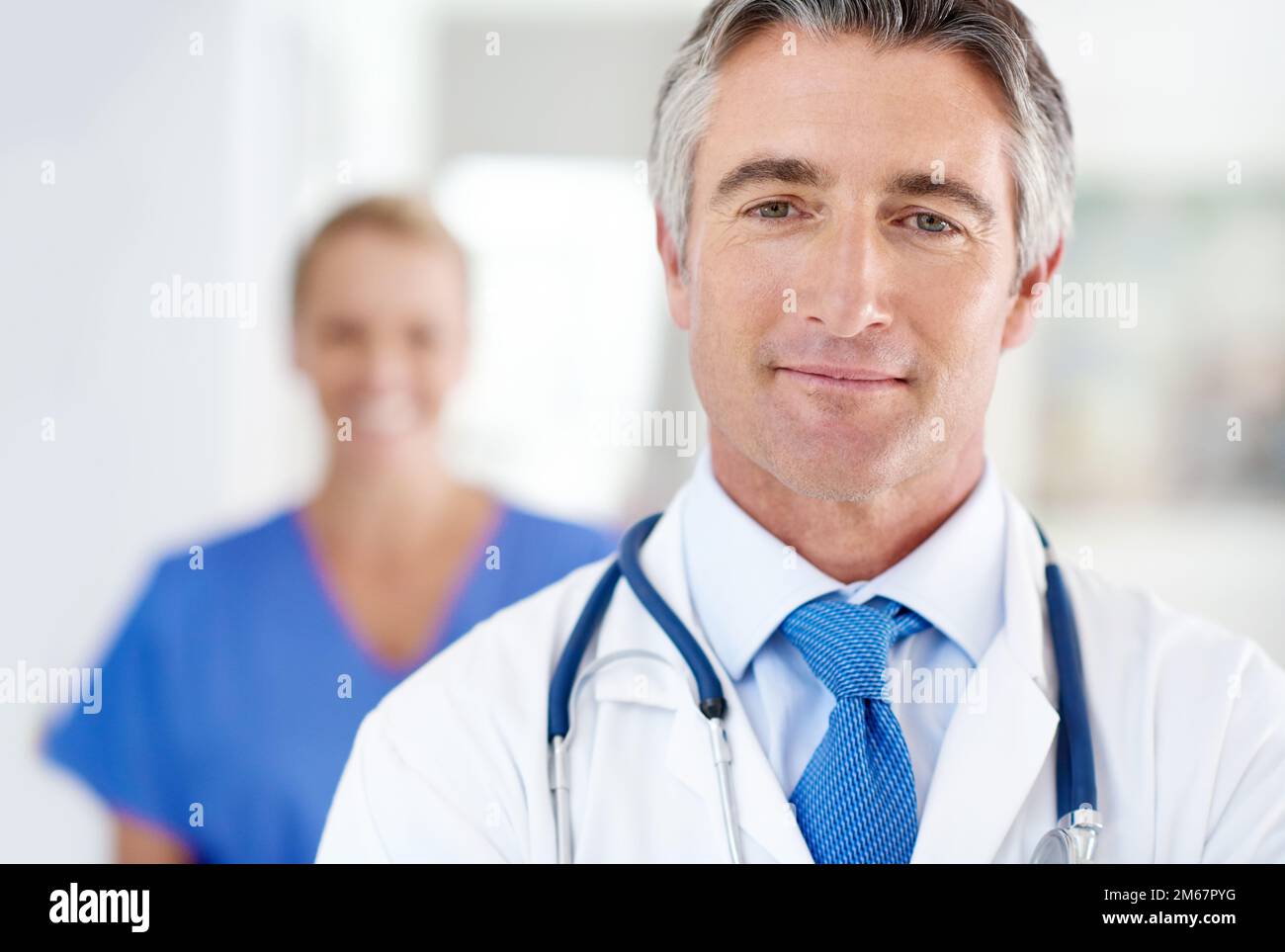 Our patients deserve the best attention. Portrait of a male doctor with ...