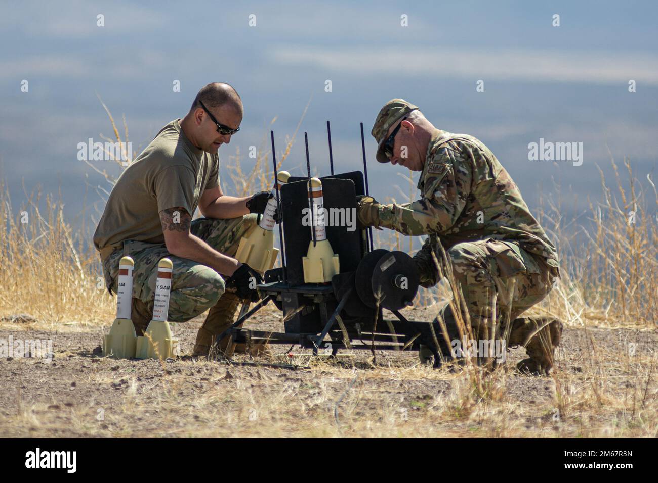Master Sgt. Tony Lager and Tech. Sgt. Brain Wolfe, munition systems ...