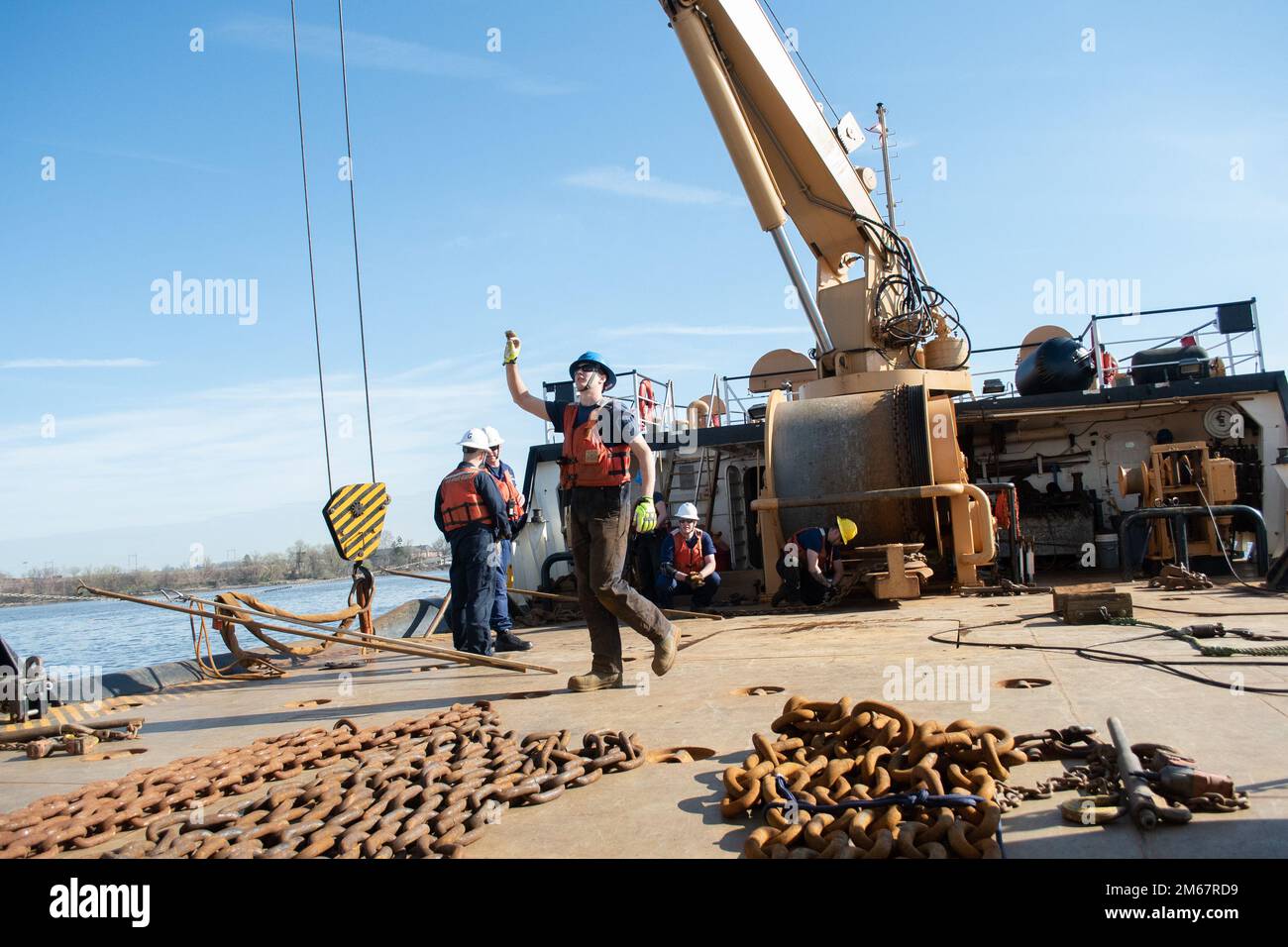 The crew of the U.S. Coast Guard Cutter William Tate works aboard the ...