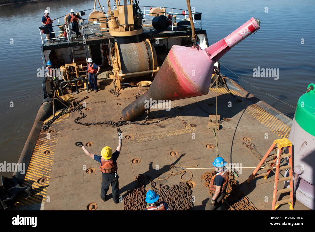 The crew of the U.S. Coast Guard Cutter William Tate works aboard the ...