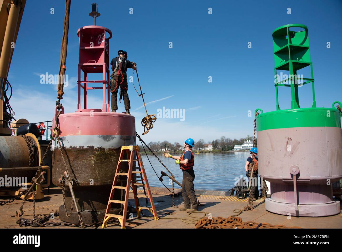The crew of the U.S. Coast Guard Cutter William Tate works aboard the ...