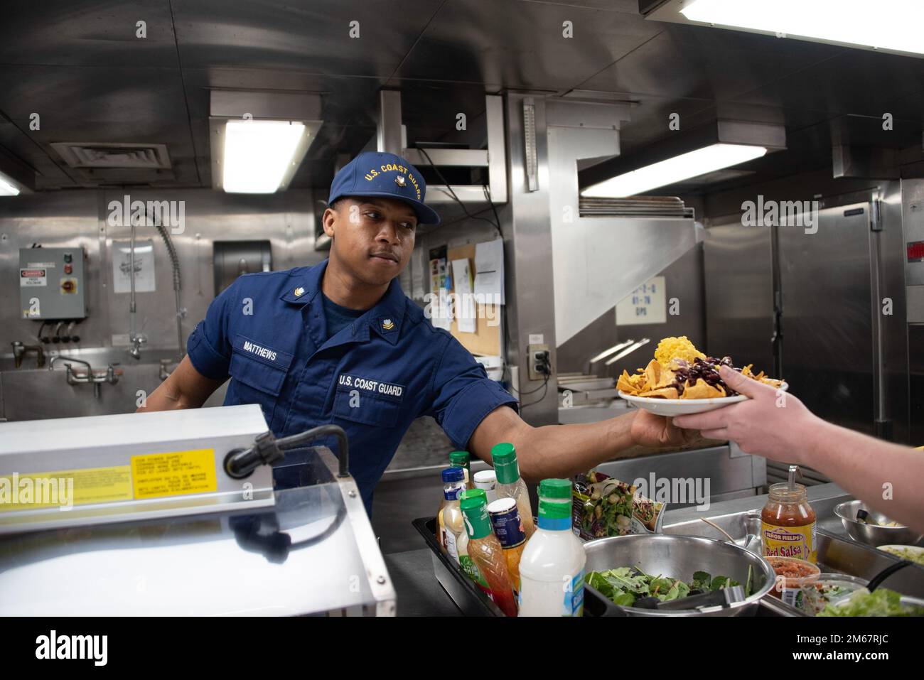 Coast Guard Petty Officer 2nd Class Quintin Matthews, a culinary ...