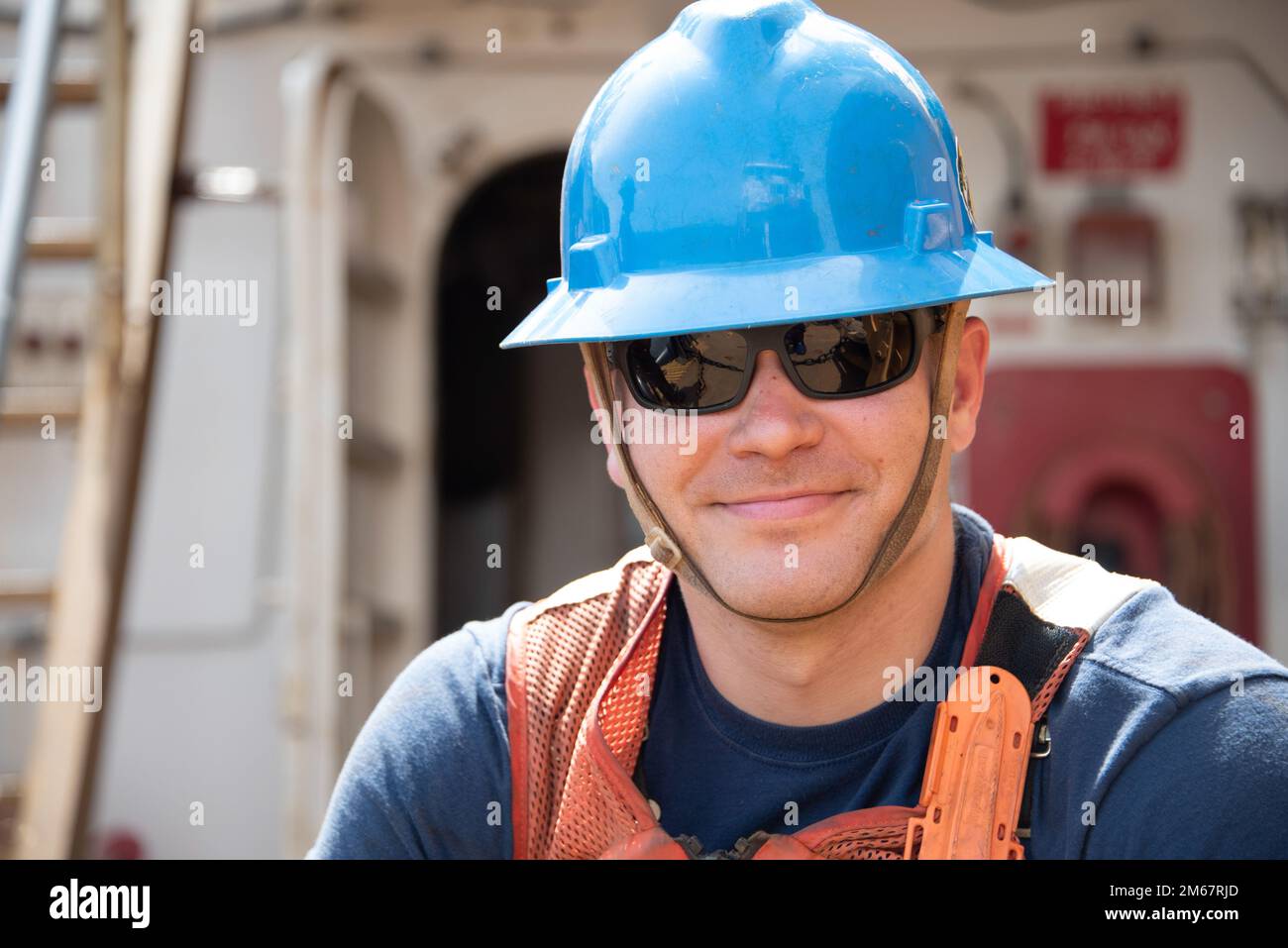 Coast Guard Petty Officer 2nd Class Hunter Mackenzie works aboard the U ...
