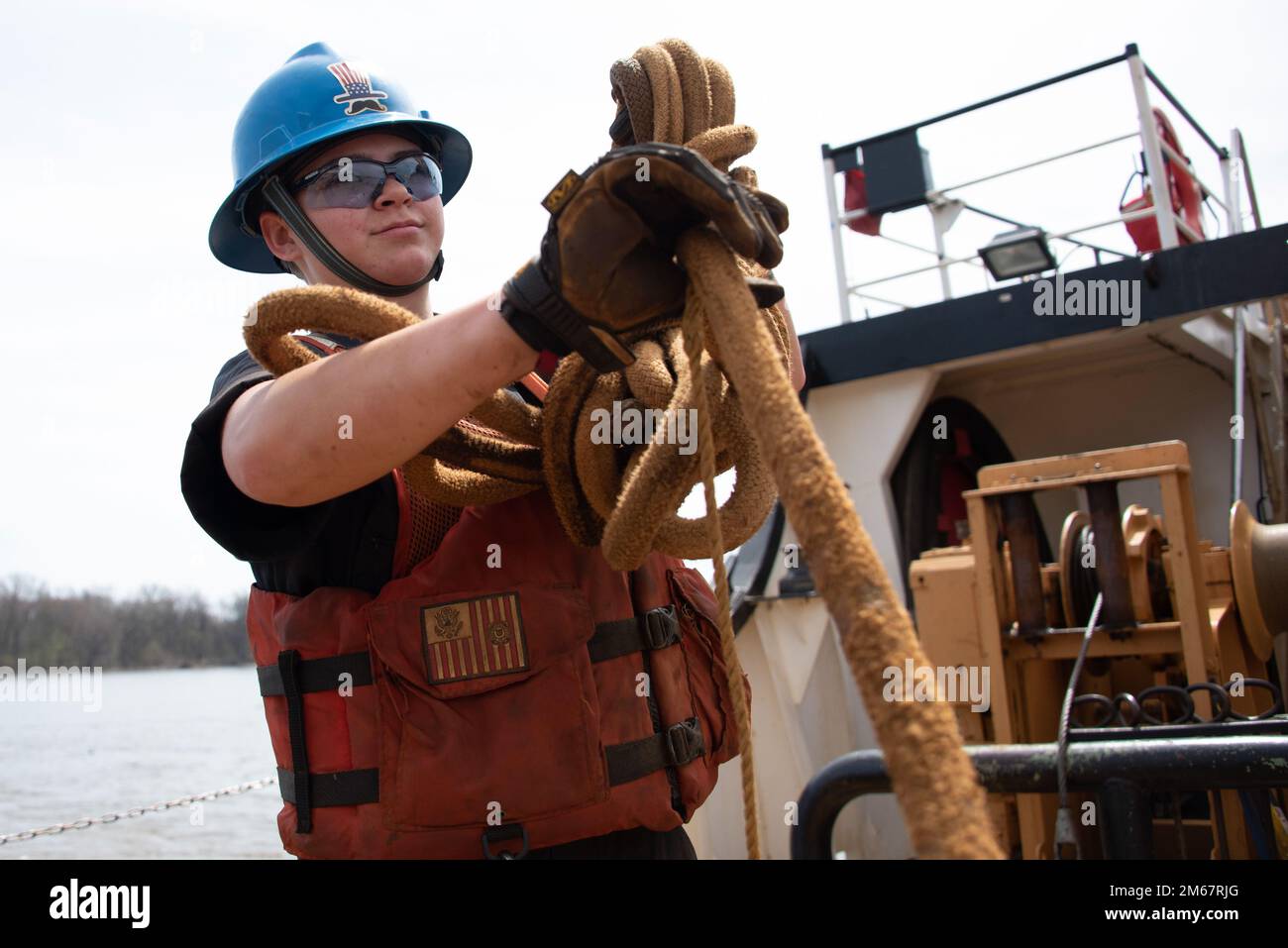 Coast Guard Seaman Jade Davis works aboard the U.S. Coast Guard Cutter ...