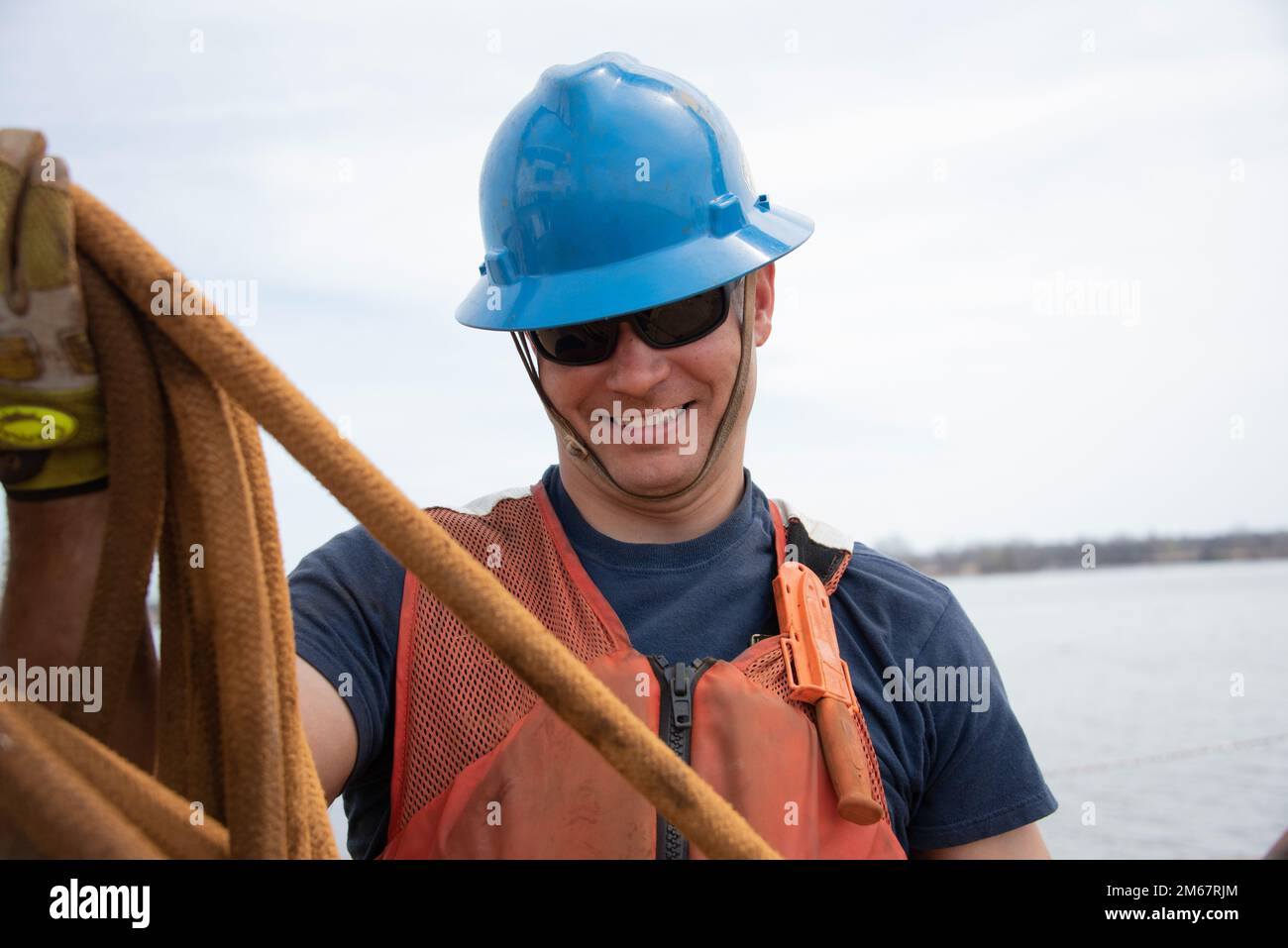 Coast Guard crew members work aboard the U.S. Coast Guard Cutter ...