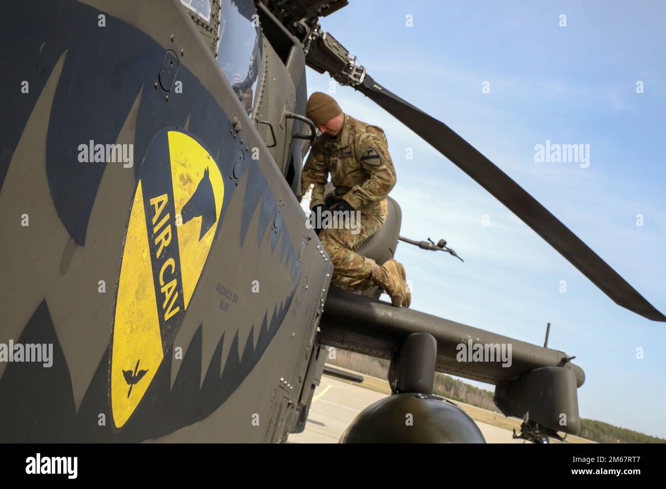 The 1st Air Cavalry Brigade, 1st Cavalry Division, Crest rests between ...