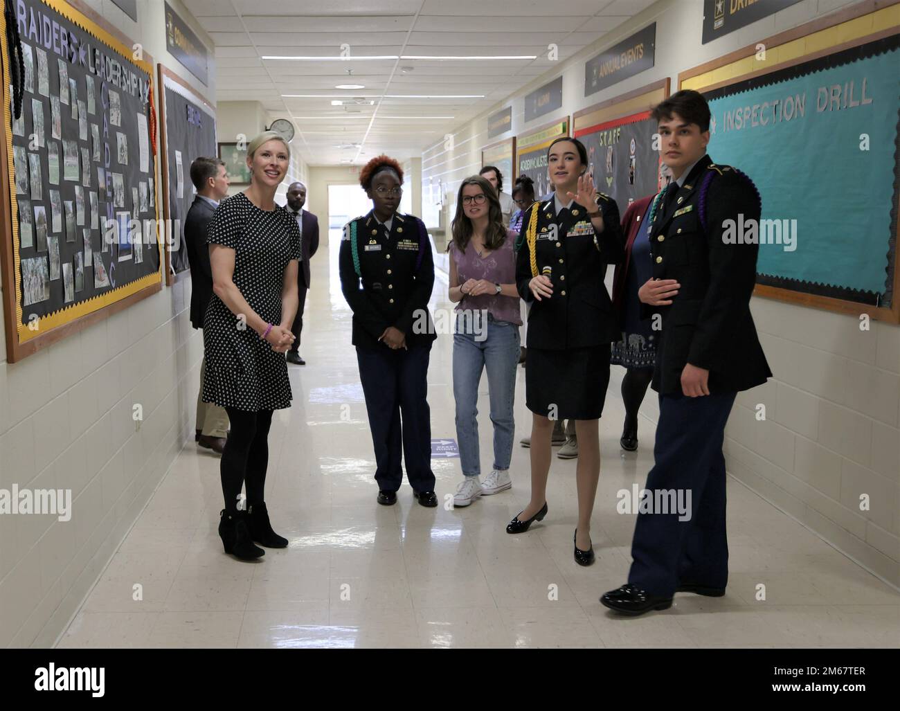 Kentucky First Lady Britainy Beshear is led through the halls of Fort ...