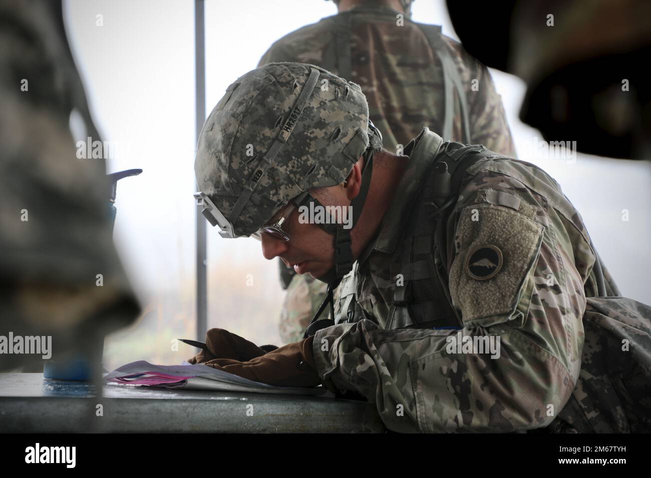 CAMP FUJI, Japan — A U.S. Army Japan soldier plots a point on a map ...