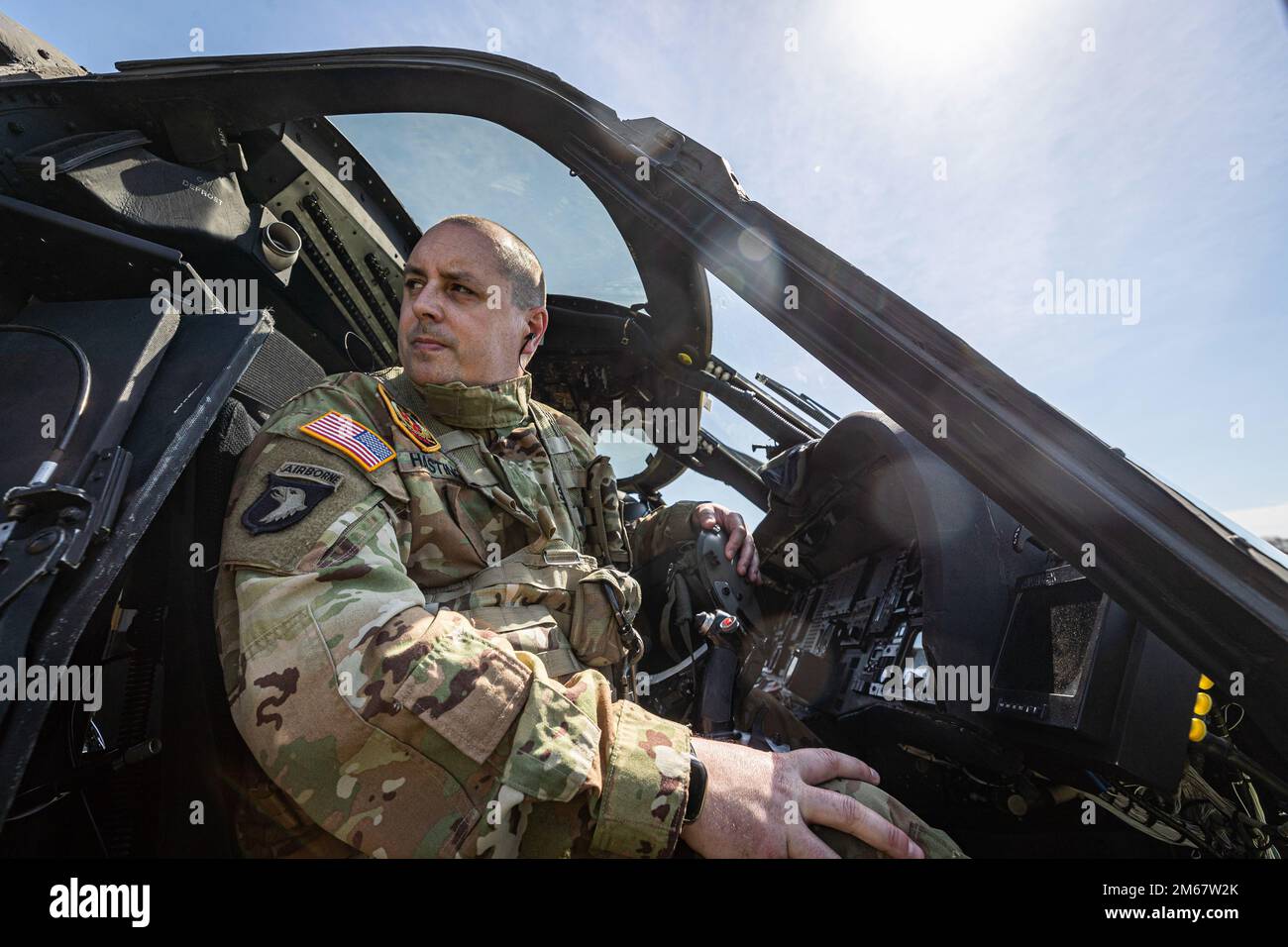 U.S. Army Chief Warrant Officer 3 Quentin Hastings, a UH-60L Black Hawk ...
