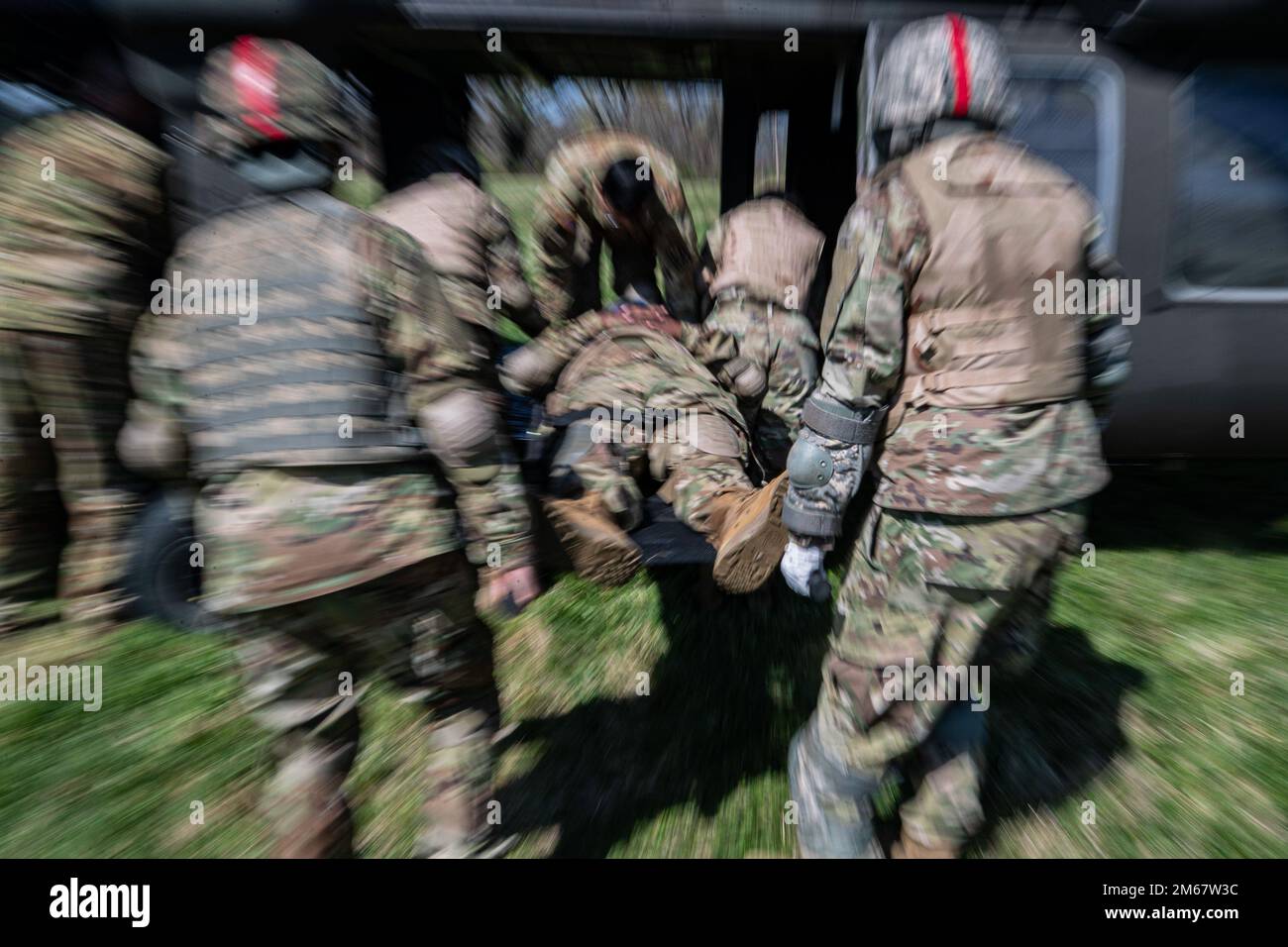 U.S. Army Soldiers load a simulated patient on to a New Jersey National ...