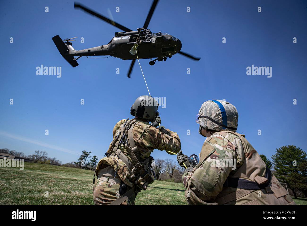 U.S. Army Staff Sgt. Michael Toth, left, a flight medic with Det. 1, C ...