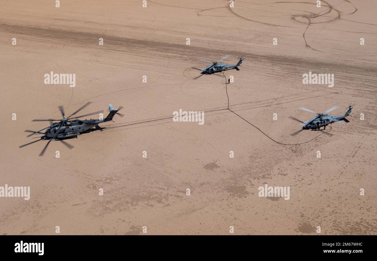 220414-N-GW654-1618 OCOTILLO WELLS, Calif. (Apr. 14, 2022) – Two MH-60S ...
