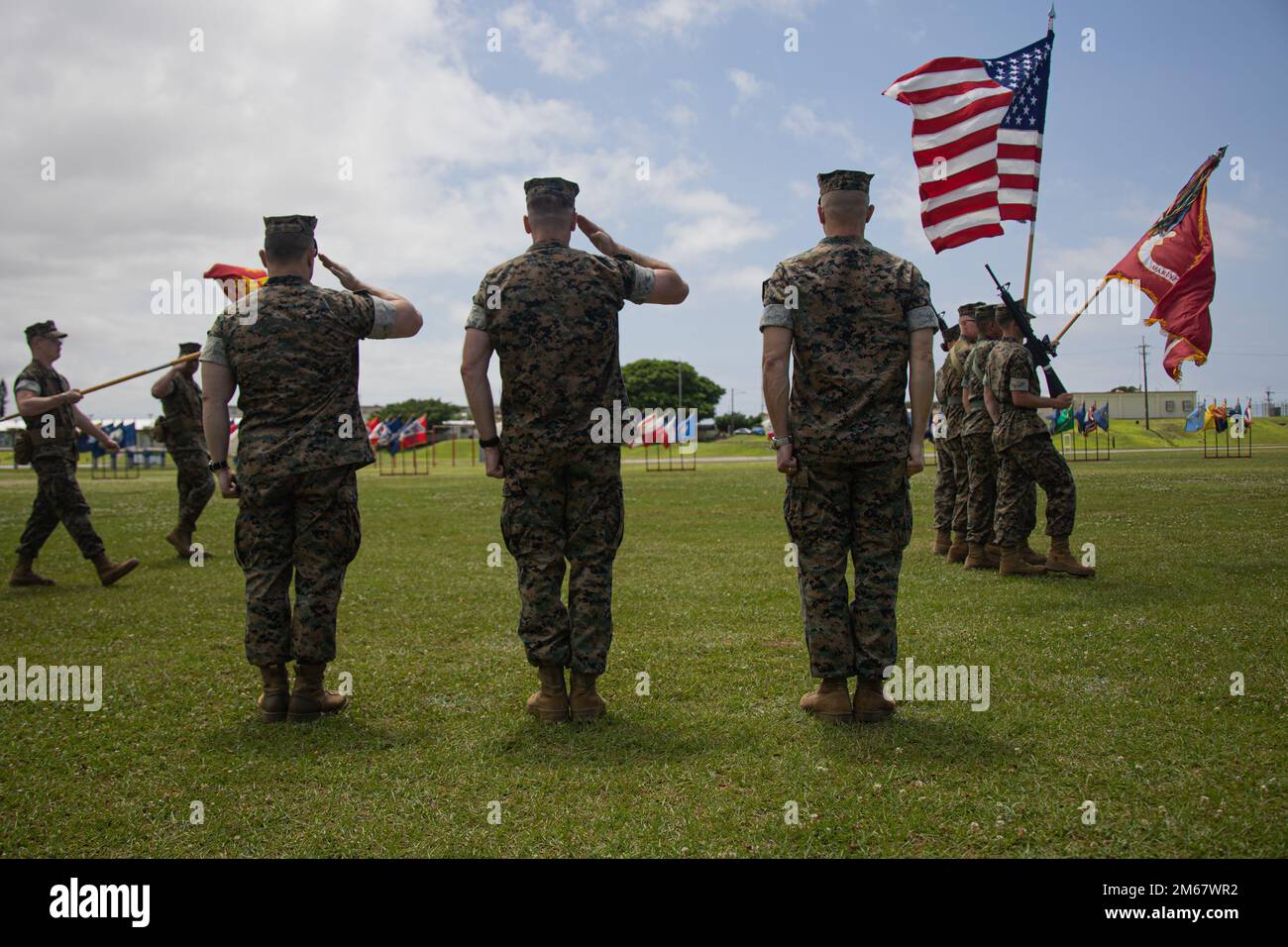 U.S. Marines assigned to Marine Air Control Squadron (MACS) 4, salute ...