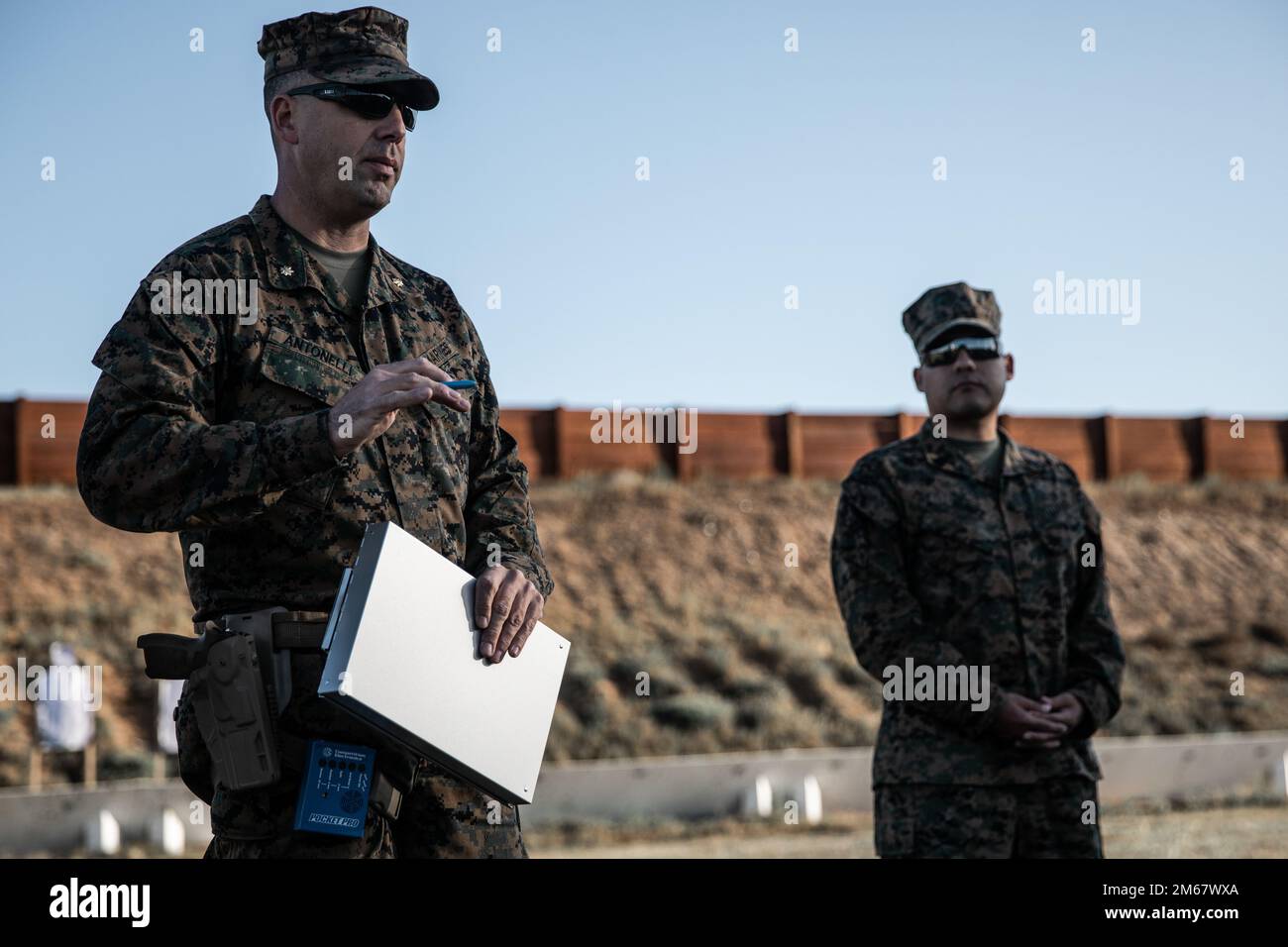 U.S. Marine Corps Maj. Eric Antonelli, left, commanding officer of ...