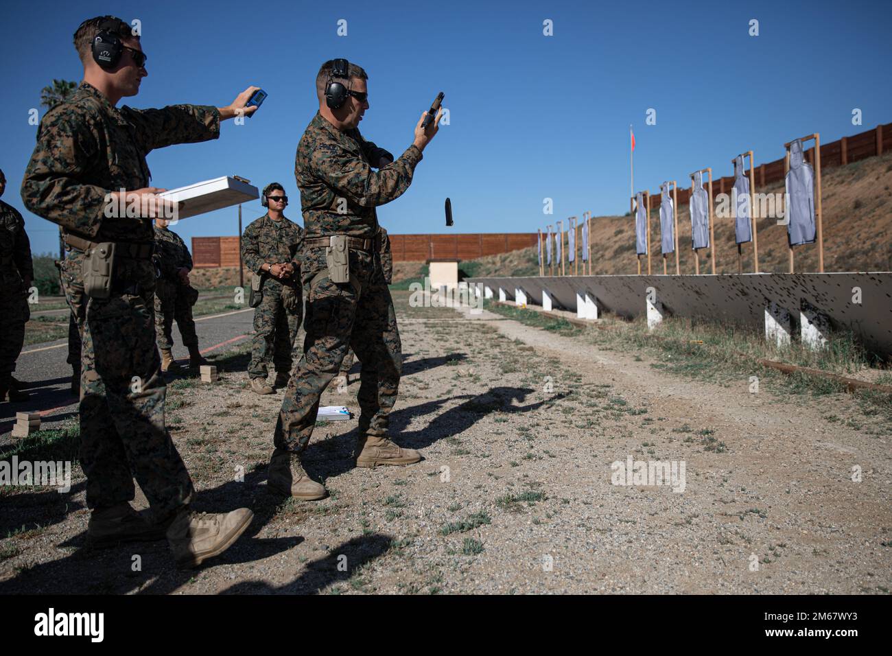 U.S. Marine Corps Maj. Eric Antonelli, right, commanding officer of ...