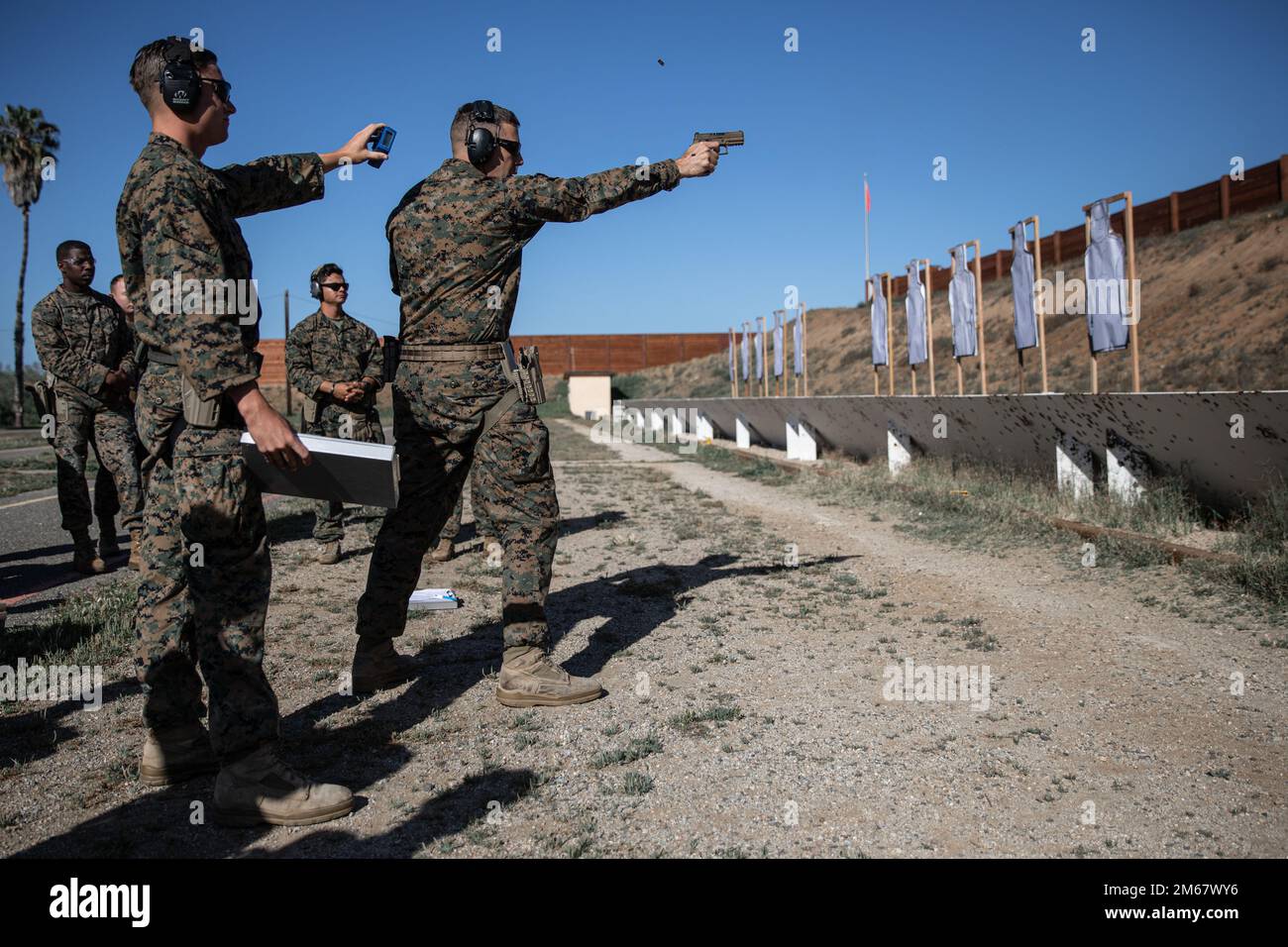 U.S. Marine Corps Maj. Eric Antonelli, right, commanding officer of ...