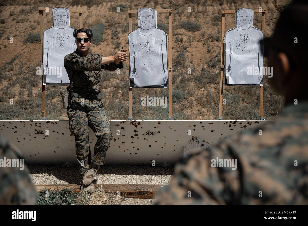 U.S. Marine Corps Sgt. Benjamin Jones, a primary marksmanship instructor with Range Company ...