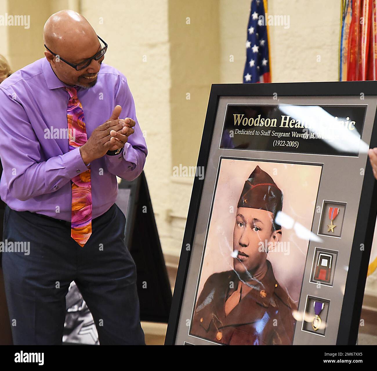Stephen Woodson looks at the plaque painting of his father, Staff Sgt ...