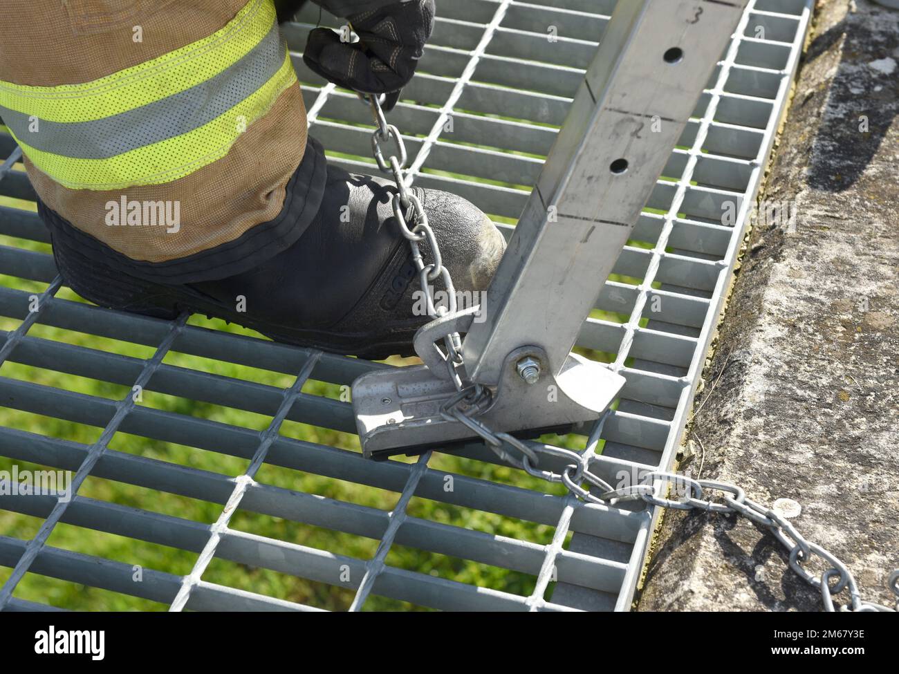 A U.S. Air Force firefighter from the 100th Civil Engineer Squadron ...